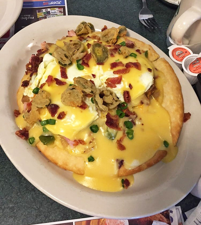 Breakfast pizza that laughs in the face of conventional morning meals. Those yolks are ready to create the kind of sauce that dreams are made of.