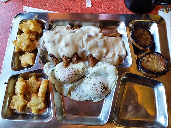 Breakfast served on a metal tray isn't camping&mdash;it's diner perfection. Those eggs and gravy-smothered potatoes are ready for takeoff.