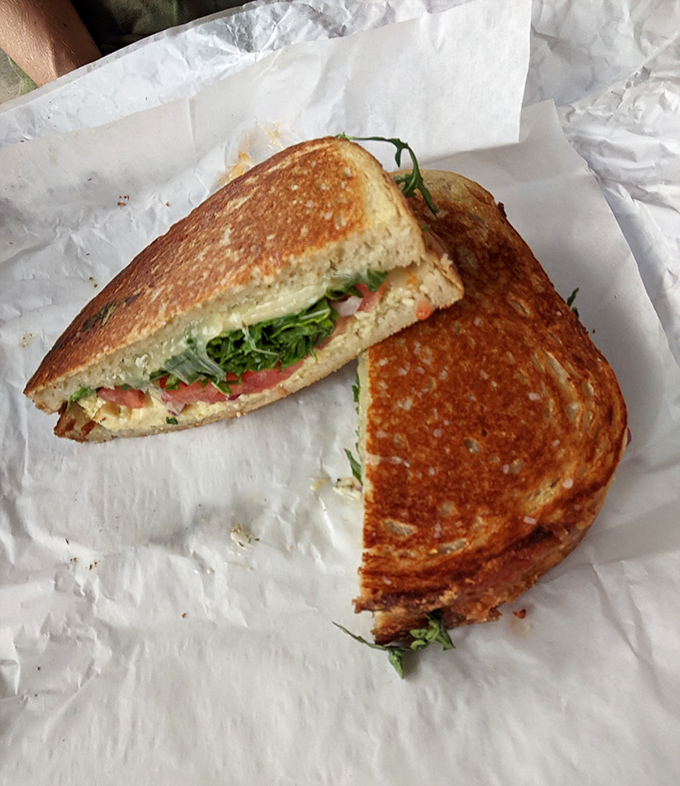 Behold the breakfast sandwich that proves sometimes the best mornings start with sourdough and pure indulgence.