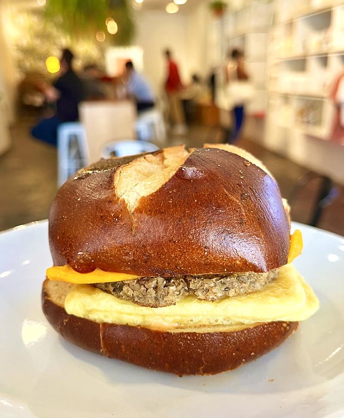 This isn't just a breakfast sandwich; it's morning salvation on a pretzel bun &ndash; the kind of protein-cheese-carb trifecta that makes waking up worthwhile.