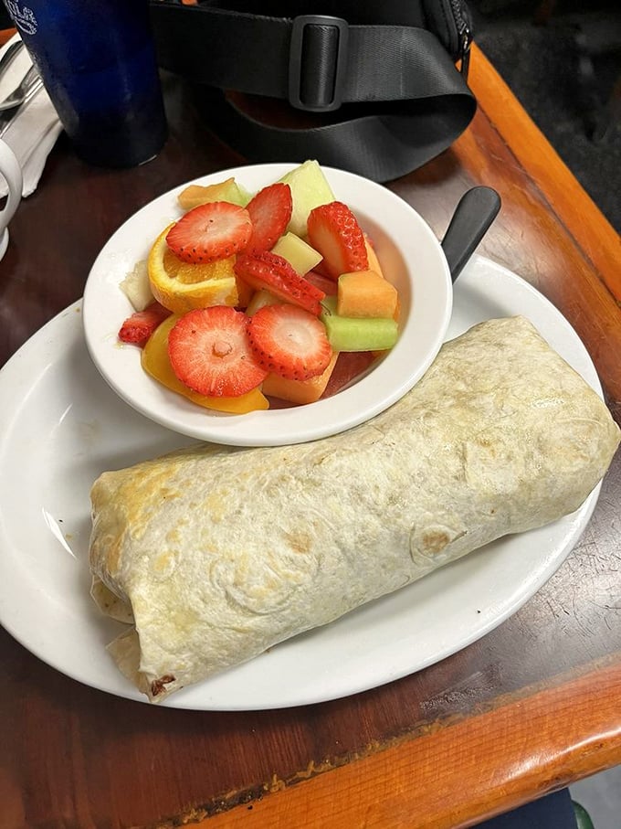 The legendary breakfast burrito, served with fresh fruit that almost makes you feel virtuous. Almost. Worth every calorie and the inevitable food coma.