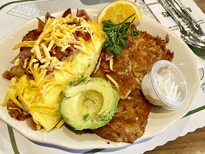 This isn't just breakfast&mdash;it's a California road trip tradition. Fluffy omelet, crispy hashbrowns, and fresh avocado create the perfect morning trio.