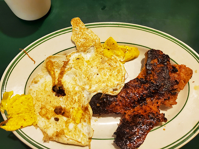 Eggs with that perfect lacy edge, and bacon that would make vegetarians question their life choices.