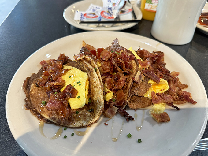 Breakfast reinvented: pancakes masquerading as tacos, loaded with eggs and bacon. Morning innovation at its finest!