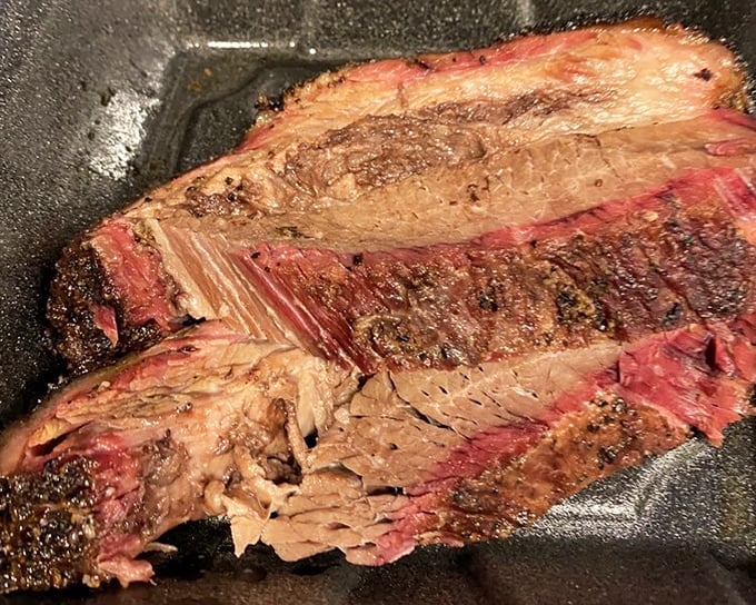 Brisket that makes time stand still. That bark, that smoke ring, that tenderness&mdash;this isn't just meat, it's edible poetry with a peppery finish.