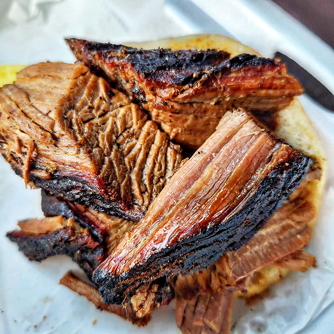 Brisket that doesn't need a filter. Those bark-crusted edges and tender meat fibers are the result of patience, smoke, and barbecue wisdom passed through generations.