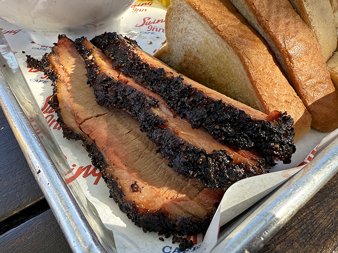Brisket with a bark so perfect it should be in a museum. That smoke ring isn't just for show&mdash;it's a flavor halo.
