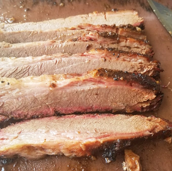 Behold the holy grail of barbecue&mdash;brisket with that perfect pink smoke ring. Each slice tells a story of patience, smoke, and time-honored technique.