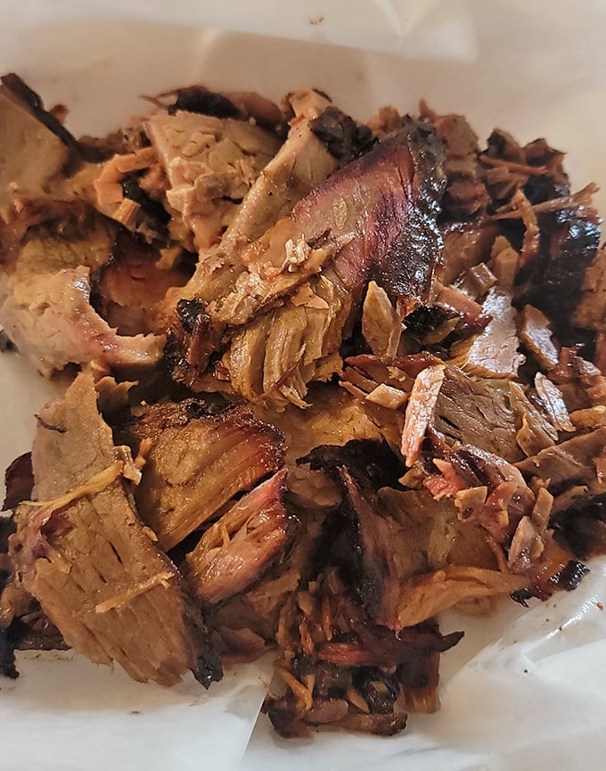 Brisket that speaks the universal language of smoke. Each charred edge and tender morsel tells the story of patience and fire.