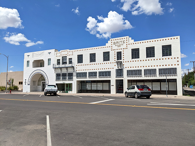 The stunning Art Deco Brite Building gleams white against the desert sky, a testament to Marfa's unexpected architectural treasures hiding in plain sight.