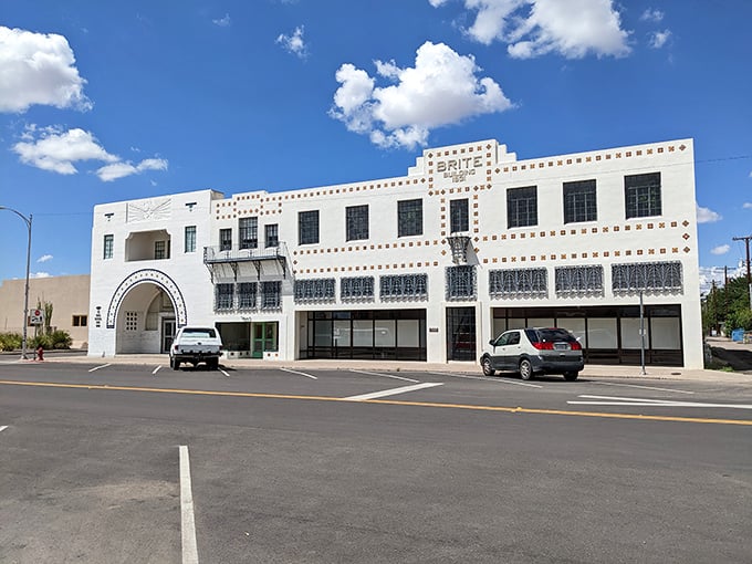The stunning Art Deco Brite Building gleams white against the desert sky, a testament to Marfa's unexpected architectural treasures hiding in plain sight.