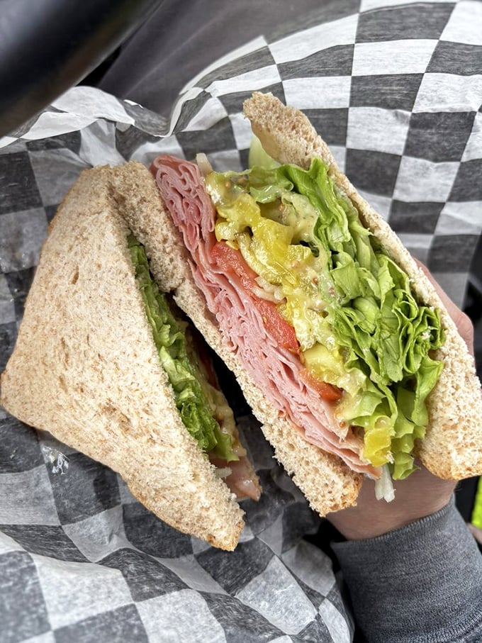 Behold the architectural marvel that is their sandwich&mdash;layers of ham, fresh veggies, and condiments stacked with more precision than the Pyramids.