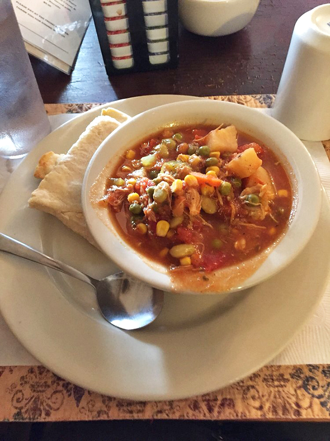 Brunswick stew that makes you want to write poetry. Each spoonful delivers a perfect harmony of chicken, vegetables, and that slow-simmered Southern magic.