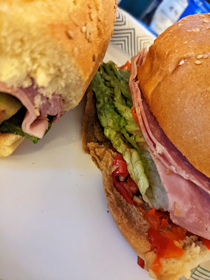 Sandwich architecture at its finest! These layers of ham, fresh veggies, and cheese create the skyscraper of sandwiches your stomach has been dreaming about.