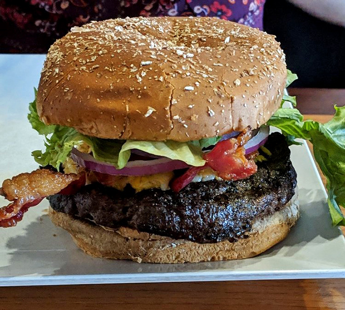 This isn't just a burger&mdash;it's a masterpiece of char-grilled perfection, where every layer from bun to bacon tells a delicious story.
