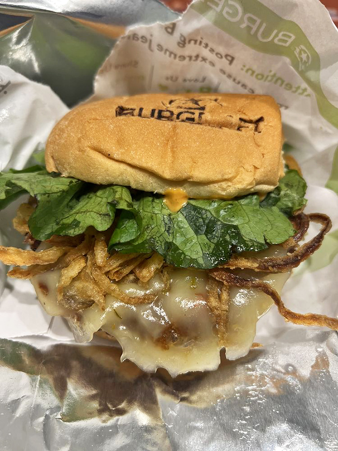 Behold the burger that'll make you question every drive-through decision you've ever made in life.