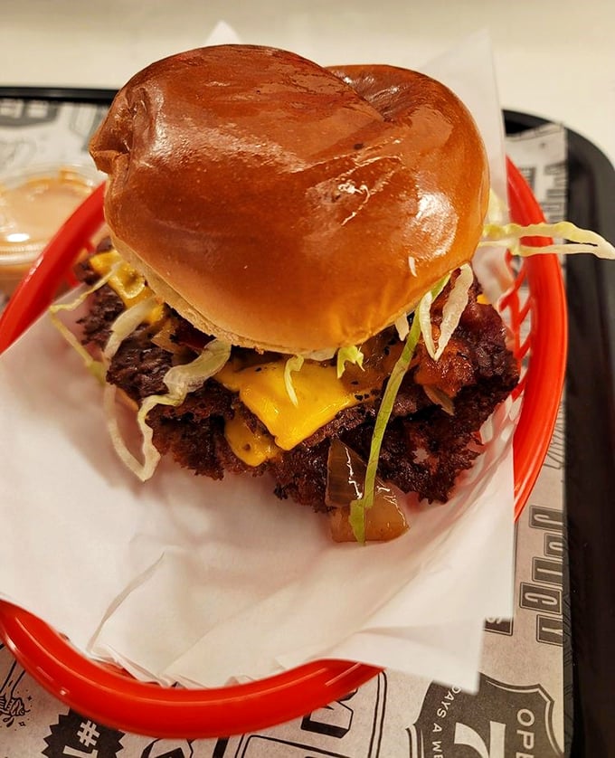 Behold the burger in all its glory&mdash;a masterpiece of beef, cheese, and toppings that makes other sandwiches question their life choices.