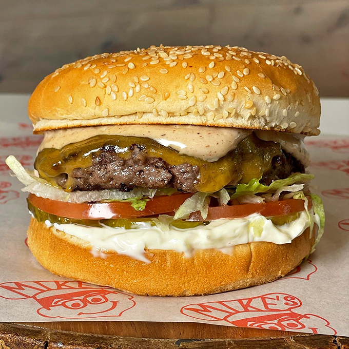This isn't just a burger&mdash;it's edible architecture. Notice how the melted cheese drapes perfectly over the patty like a yellow security blanket.