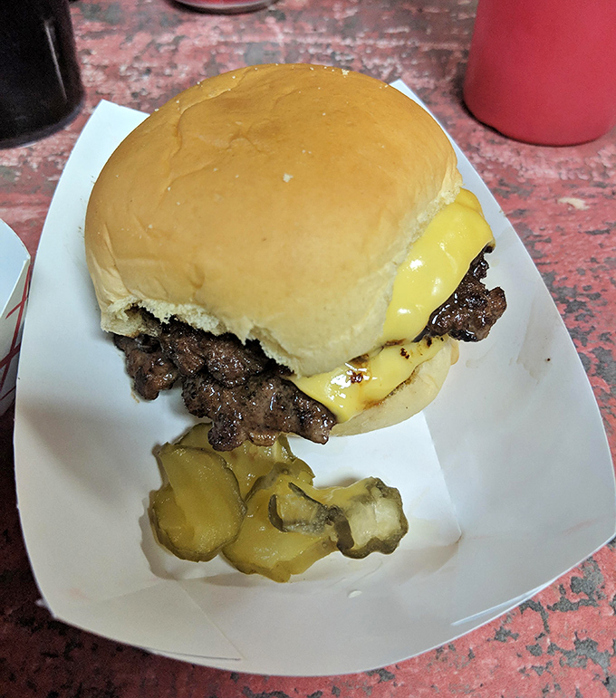 Behold the cheeseburger's Cuban cousin &ndash; juicy, seasoned beef topped with melty cheese that makes first-timers wonder where it's been all their lives.