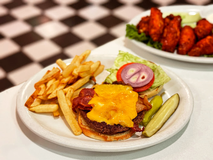 Behold the burger that makes grown adults weep tears of pure joy and golden fry perfection.