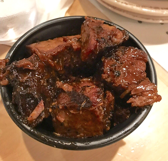 These burnt ends aren't just meat candy&mdash;they're edible time capsules capturing hours of smoke, spice, and patience in each glistening, caramelized cube.