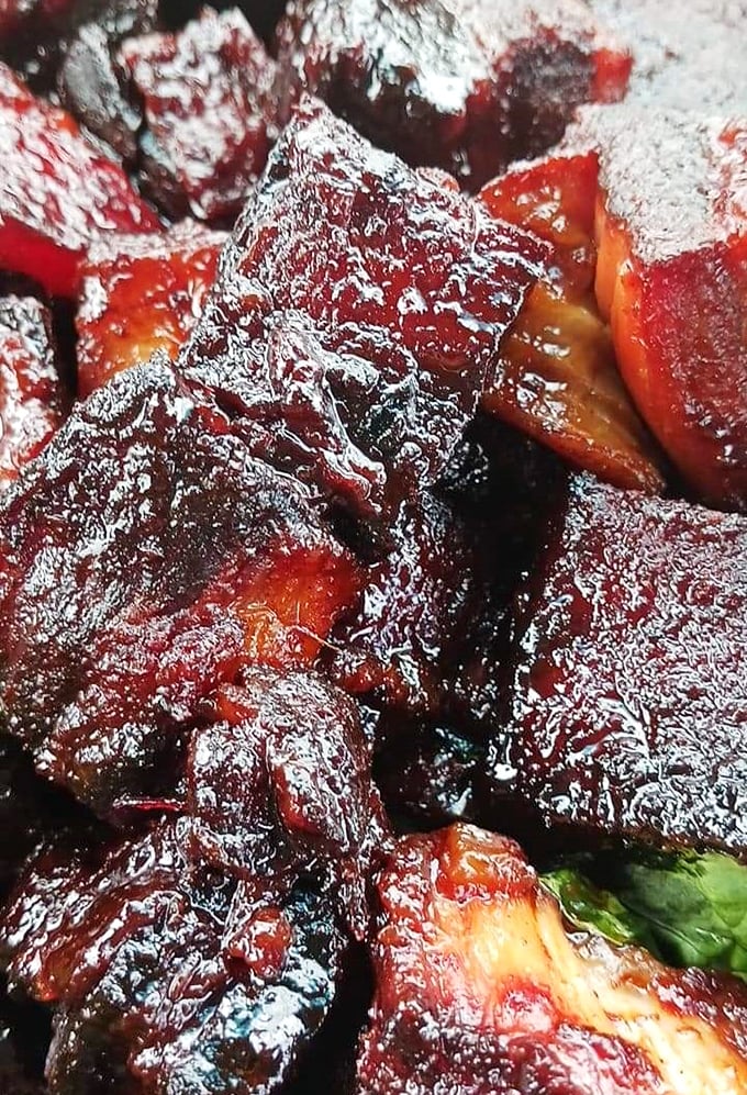 These burnt ends aren't just smoked&mdash;they're having a caramelized love affair with that glaze. Napkins required, regrets impossible.