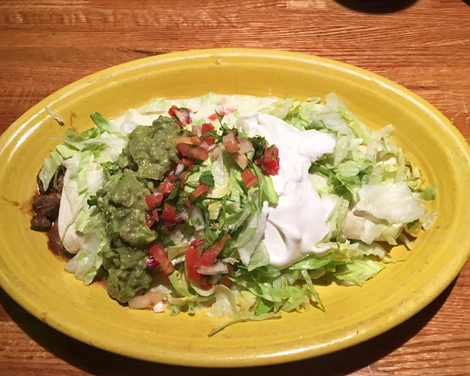 This burrito could feed a small village, packed with enough flavor to make your taste buds write home.