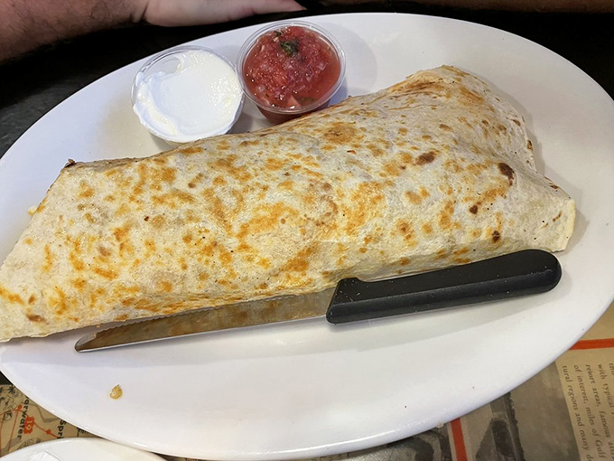 The Burrito Buster isn't just a breakfast wrap &ndash; it's a tortilla fortress protecting a treasure of eggs, cheese, and savory fillings from fork-wielding invaders.