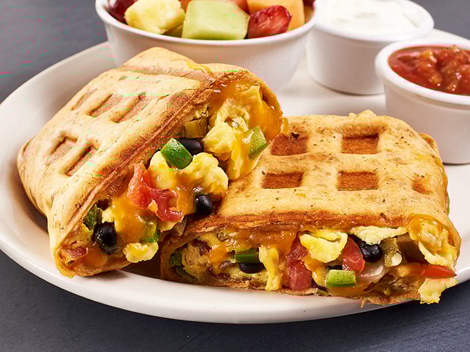 Breakfast innovation at its finest! This waffle sandwich stuffed with colorful veggies and eggs proves that diners aren't just about nostalgia&mdash;they're about delicious creativity.