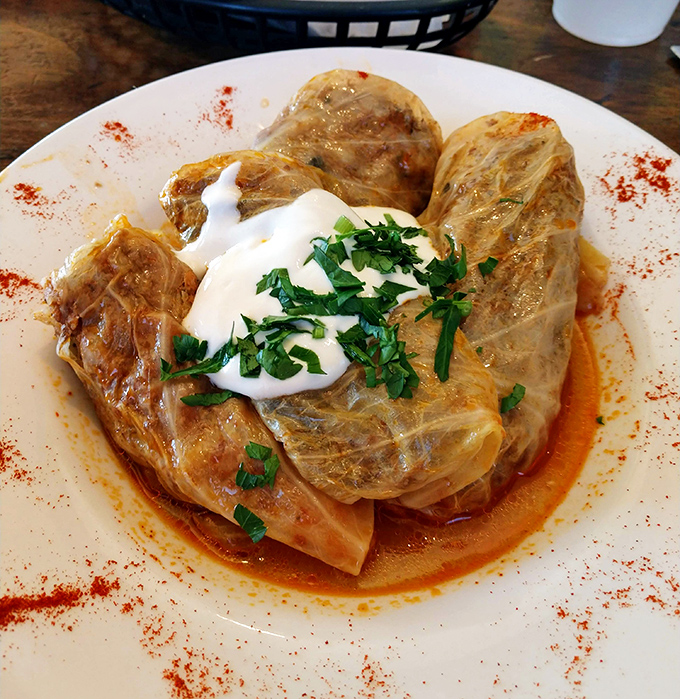 These cabbage rolls aren't your grandmother's recipe (unless she's from the Caucasus). Tender leaves cradle savory fillings in a sauce worth sopping up with homemade bread.