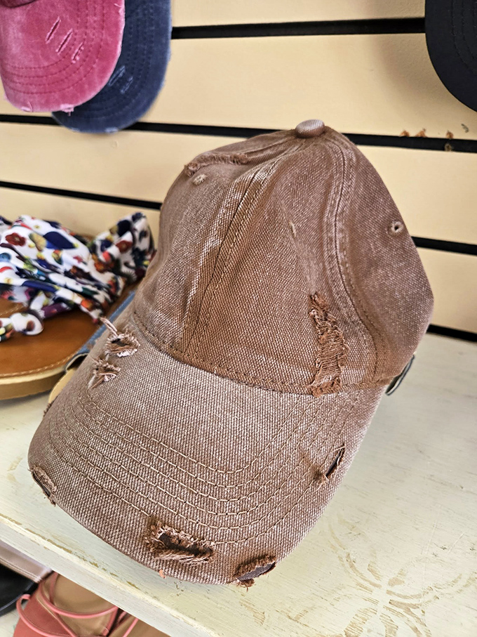Even distressed caps tell stories. This well-loved hat waits for someone who appreciates character over perfection—fashion with history built in.