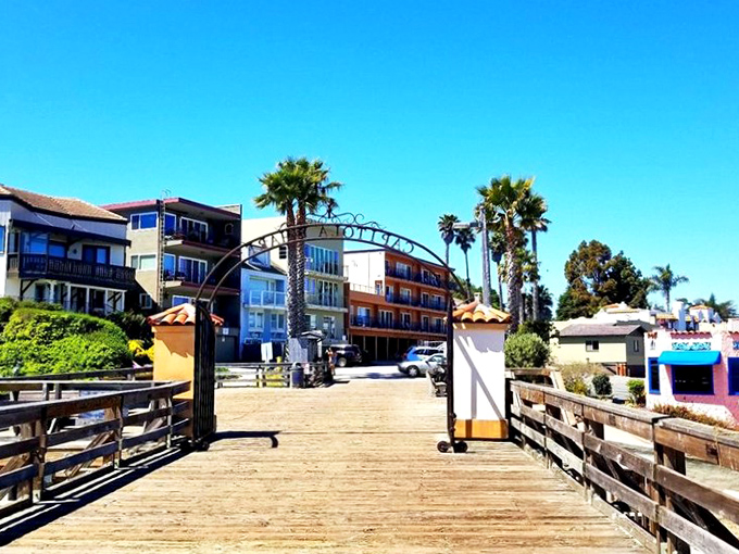 The wooden archway to Capitola Wharf beckons visitors to venture out over the Pacific. Your Instagram feed has been waiting for this moment.