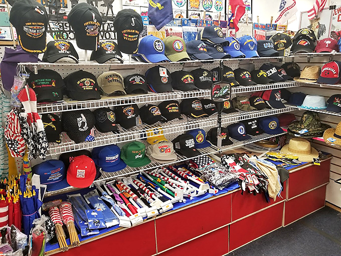 The hat section could outfit a small army of sun-conscious beachgoers. Military caps share space with vacation visors in this headwear headquarters.