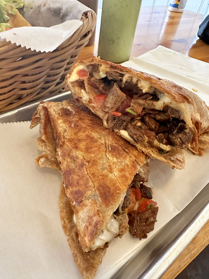 This quesadilla doesn't just whisper "eat me"—it belts it out like Aretha Franklin demanding R-E-S-P-E-C-T for properly melted cheese.