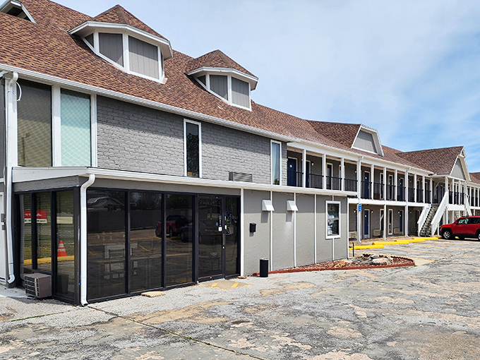 The Carthage Inn stands as a testament to mid-century motor lodge design, when road trips were adventures and continental breakfast meant a donut and lukewarm coffee.