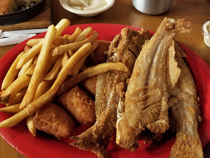 Golden-fried catfish that makes you question every other fish you've ever eaten. That perfect cornmeal crust should be studied by culinary scientists.