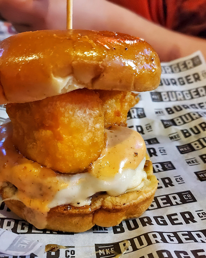 Behold the cheese curd burger - proof that sometimes the craziest ideas are pure genius.