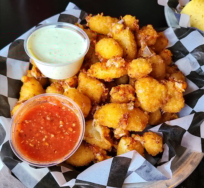 Golden cheese curds that stretch like heartstrings - Wisconsin's gift to humanity, perfected in Michigan.