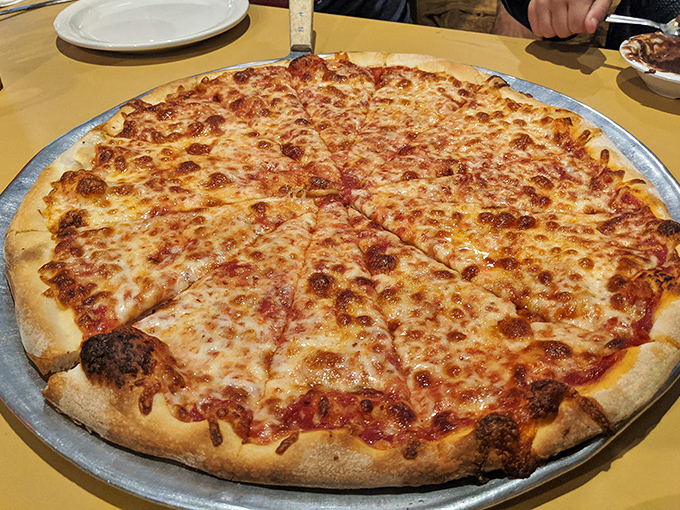 The star of the show! This cheese pizza isn't just food&mdash;it's edible geometry where every triangle equals pure happiness.