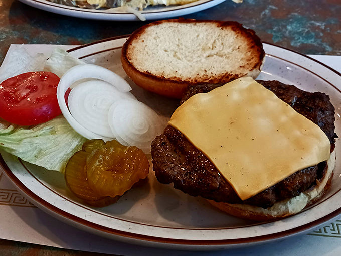 Behold the star of the show&mdash;a perfectly proportioned cheeseburger that doesn't need Instagram filters or fancy toppings to make your mouth water.
