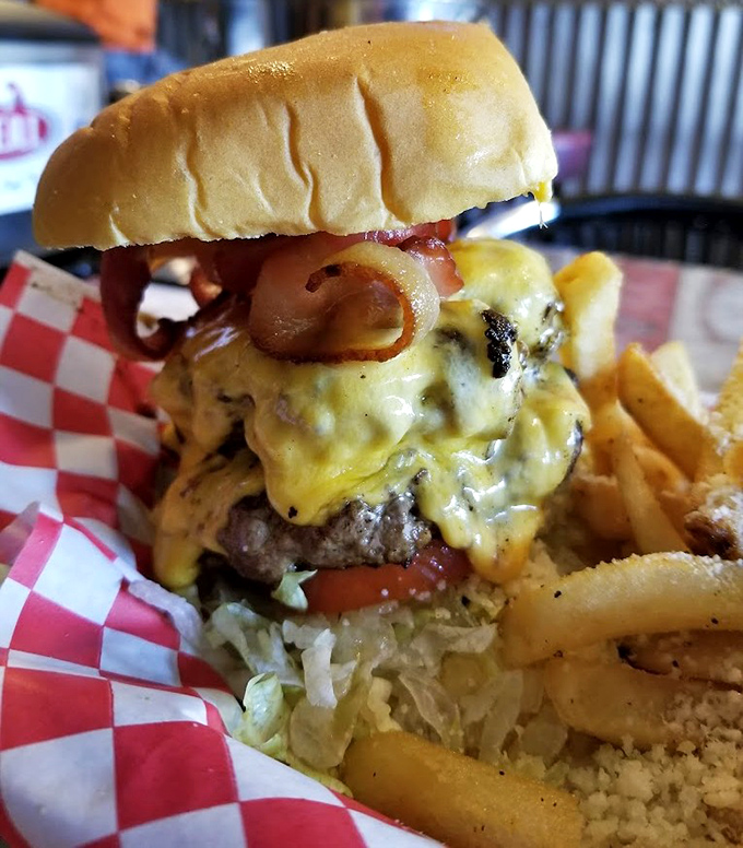 Behold the Inside-Out Juicy Lucy – where cheese doesn't just top the burger, it becomes the star.