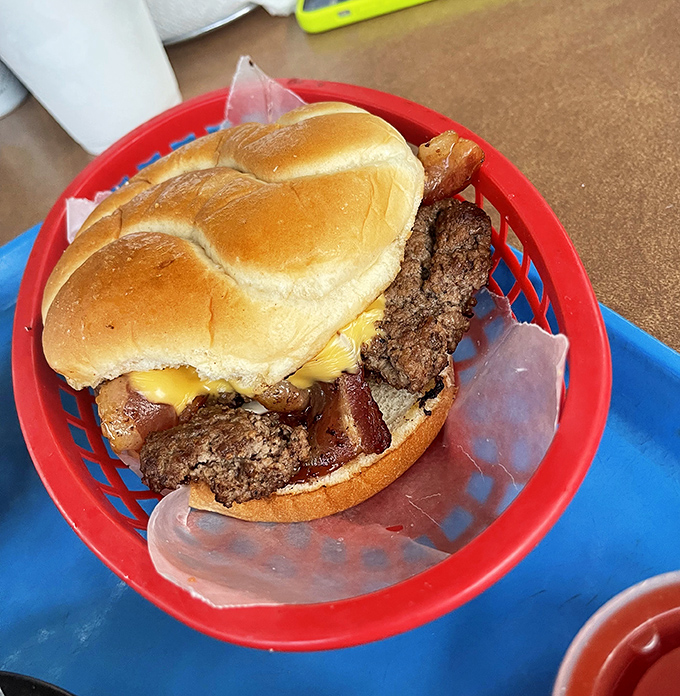 Behold the Chapman Burger in all its glory &ndash; where beef, ham, and cheese unite in a holy trinity of flavor that'll haunt your dreams.