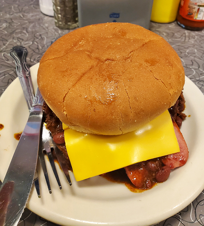 This isn't just a cheeseburger &ndash; it's edible nostalgia, with American cheese melting into a perfectly griddled patty on a toasted bun.