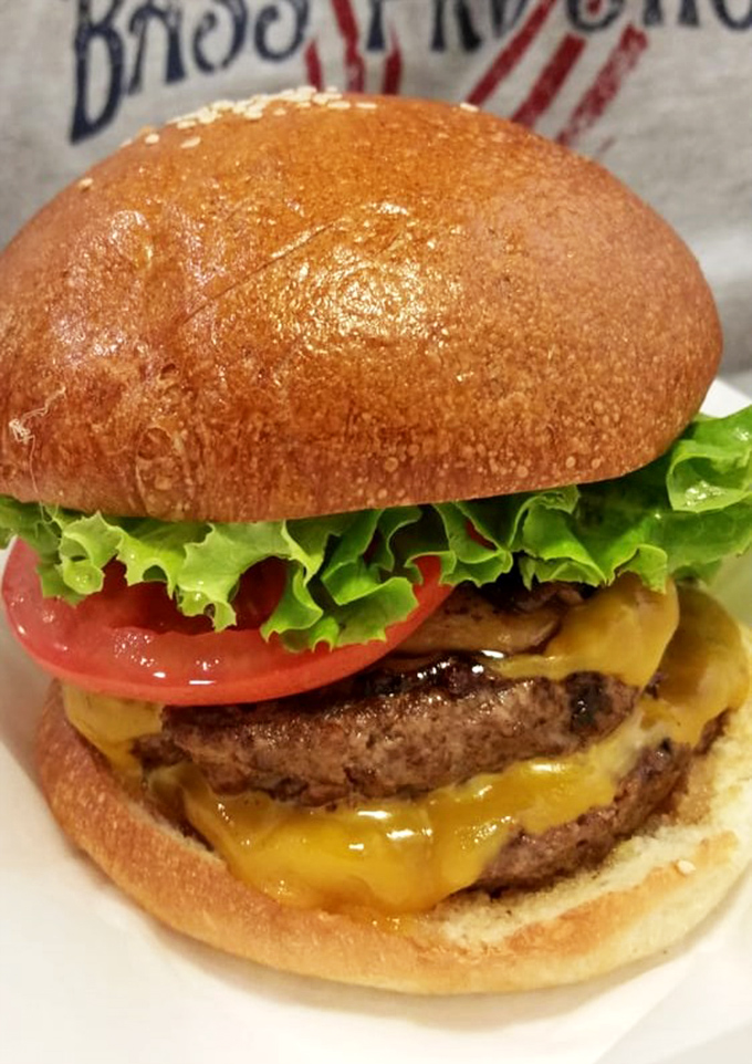 This isn't just a cheeseburger&mdash;it's edible architecture where each layer plays its part in a symphony of savory perfection.