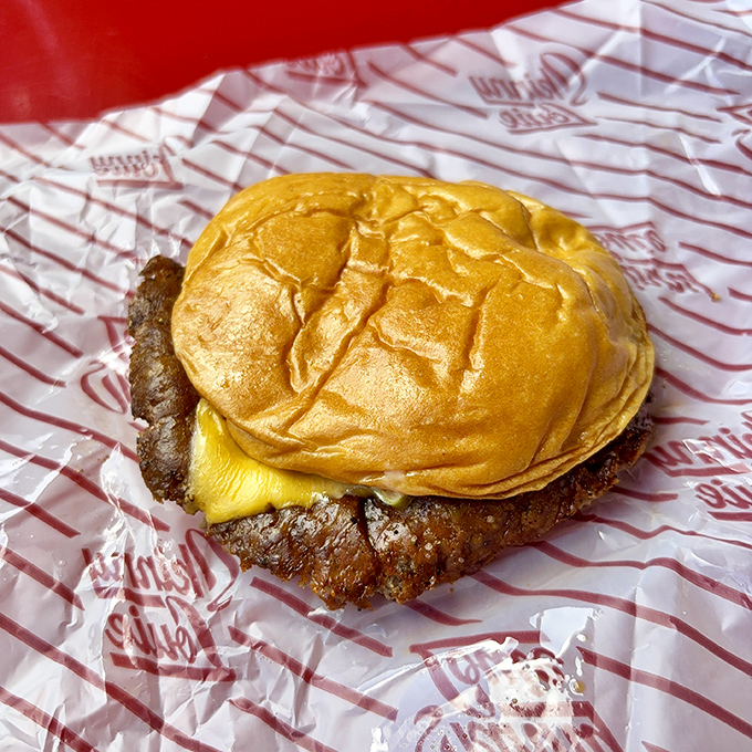 This isn't just a cheeseburger&mdash;it's edible architecture where every layer contributes to a symphony of flavors that makes your taste buds dance.