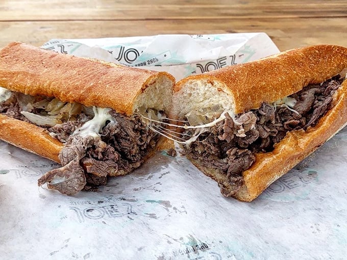 Behold the star of the show &ndash; ribbons of beef embraced by melted cheese in a perfect bread vessel. Poetry you can eat.