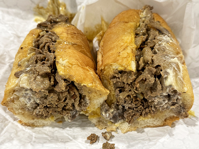 Behold the cheesesteak in its natural glory&mdash;thinly sliced ribeye embracing melted cheese like they've been waiting their whole lives for this moment.