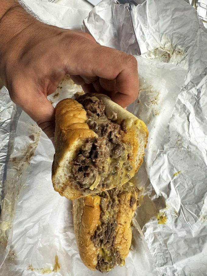 Behold the star of the show! Thinly sliced rib-eye nestled in a perfect roll&mdash;this isn't just a sandwich, it's edible architecture.