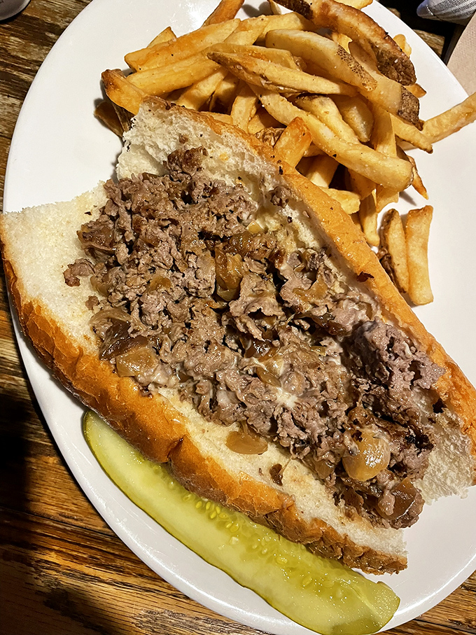 Behold the star of our show&mdash;thinly sliced ribeye, perfectly caramelized onions, and melted cheese that stretches like it's auditioning for the Olympics.