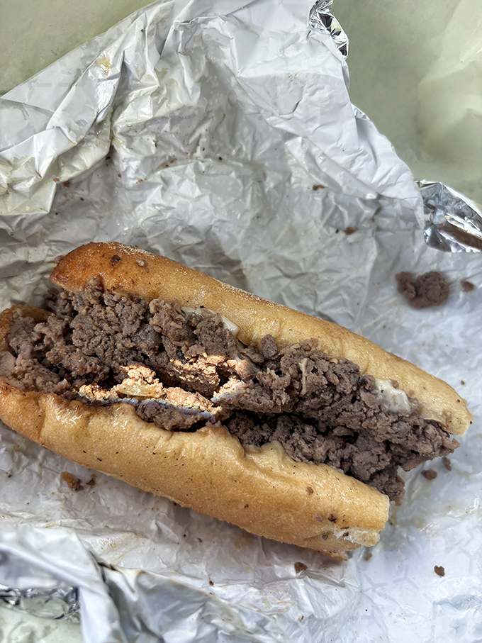 This isn't just a sandwich; it's Philadelphia's soul wrapped in paper. Perfectly chopped sirloin meets its destiny in a fresh-baked roll.